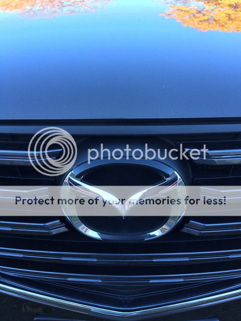 My custom Evil M front and read badges | Mazdas247